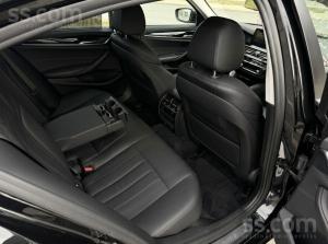 Black BMW 530 2018 in Riga, with an engine capacity of 3.00 L and mileage of 165 thousand km for 21490 €, photo 13 on AUTOMOTO.COM.LV