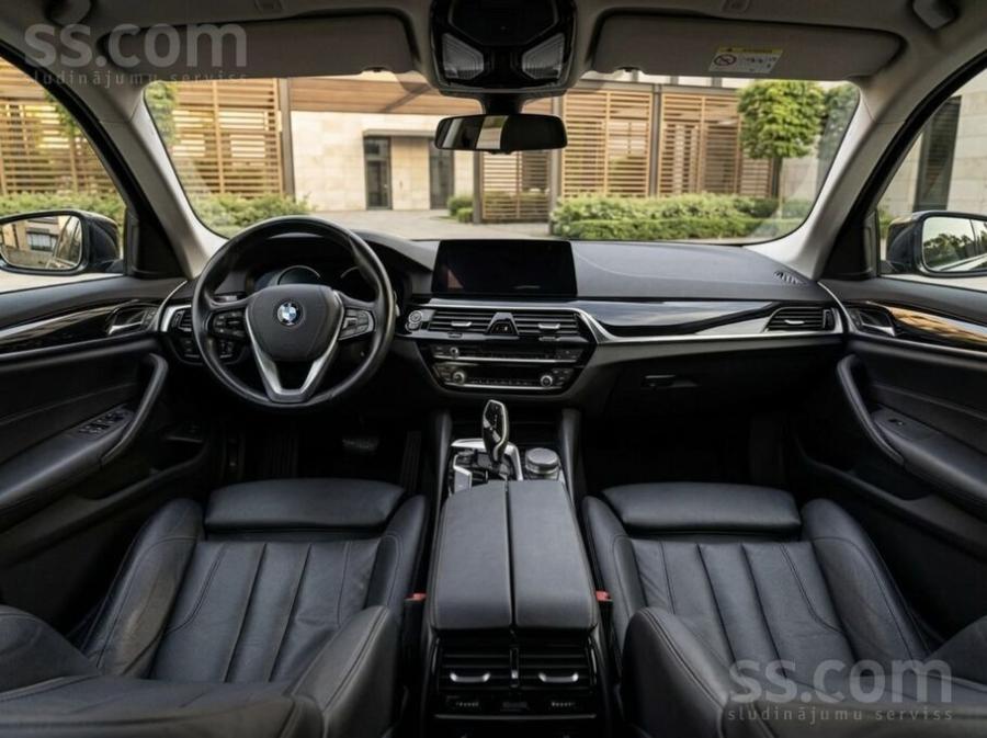 Black BMW 530 2018 in Riga, with an engine capacity of 3.00 L and mileage of 165 thousand km for 21490 €, photo 23 on AUTOMOTO.COM.LV
