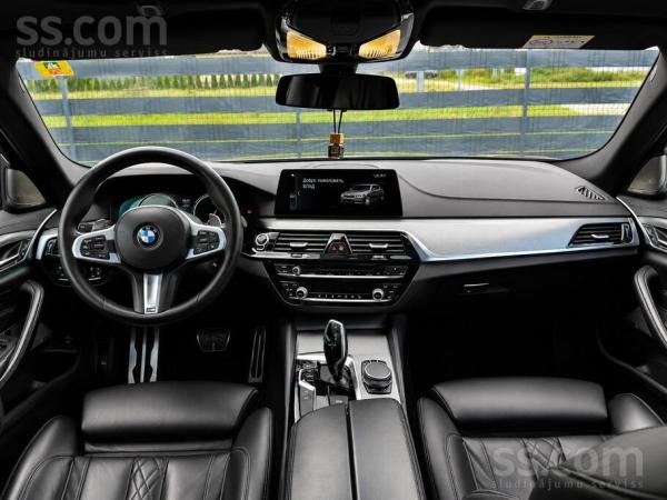Black BMW 530 2018 in Riga, with an engine capacity of 2.00 L and mileage of 223 thousand km for 28450 €, photo 9 on AUTOMOTO.COM.LV