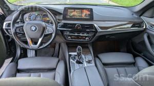 Black BMW 530 2018 in Ogre, with an engine capacity of 2.00 L and mileage of 83 thousand km for 24500 €, photo 12 on AUTOMOTO.COM.LV