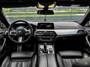 Black BMW 530 2018 in Riga, with an engine capacity of 2.00 L and mileage of 223 thousand km for 27900 €, photo 10 on AUTOMOTO.COM.LV