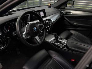 Black BMW 530 2018 in Riga, with an engine capacity of 2.00 L and mileage of 223 thousand km for 27900 €, photo 11 on AUTOMOTO.COM.LV