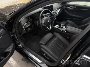 Black BMW 530 2018 in Riga, with an engine capacity of 3.00 L and mileage of 165 thousand km for 19990 €, photo 10 on AUTOMOTO.COM.LV
