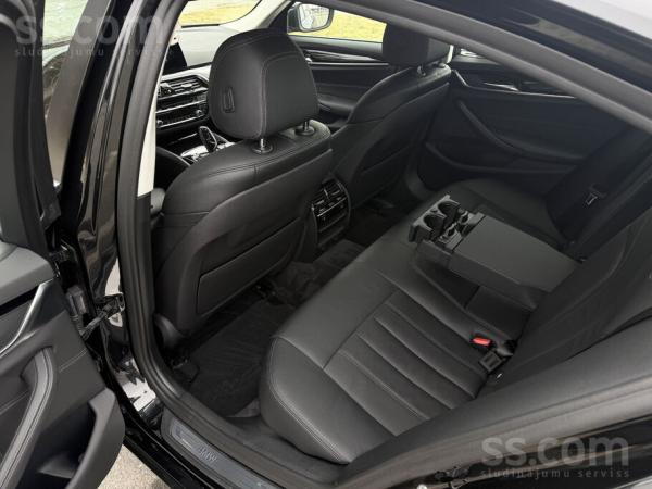 Black BMW 530 2018 in Riga, with an engine capacity of 3.00 L and mileage of 165 thousand km for 19990 €, photo 10 on AUTOMOTO.COM.LV