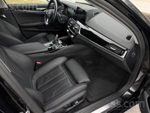 Black BMW 530 2018 in Riga, with an engine capacity of 3.00 L and mileage of 165 thousand km for 19990 €, photo 13 on AUTOMOTO.COM.LV