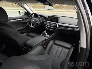 Black BMW 530 2018 in Riga, with an engine capacity of 3.00 L and mileage of 165 thousand km for 19990 €, photo 18 on AUTOMOTO.COM.LV