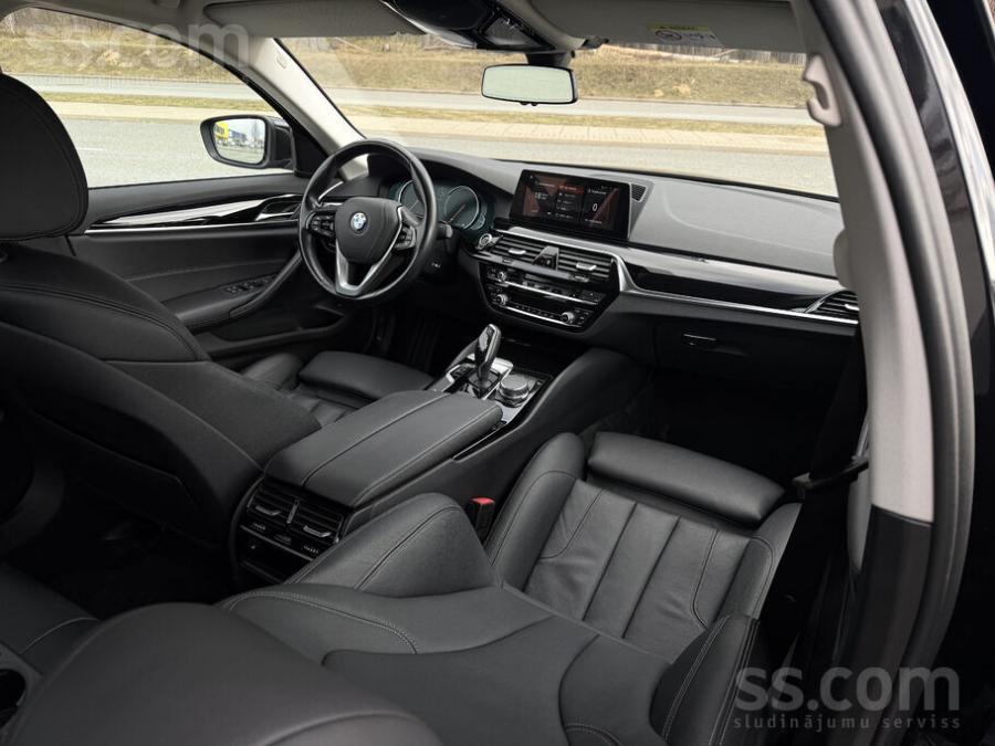 Black BMW 530 2018 in Riga, with an engine capacity of 3.00 L and mileage of 165 thousand km for 19990 €, photo 18 on AUTOMOTO.COM.LV