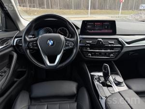 Black BMW 530 2018 in Riga, with an engine capacity of 3.00 L and mileage of 165 thousand km for 19990 €, photo 21 on AUTOMOTO.COM.LV