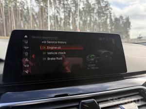 Black BMW 530 2018 in Riga, with an engine capacity of 3.00 L and mileage of 165 thousand km for 19990 €, photo 24 on AUTOMOTO.COM.LV