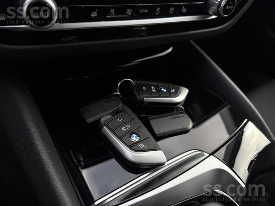 Black BMW 530 2018 in Riga, with an engine capacity of 3.00 L and mileage of 165 thousand km for 19990 €, photo 25 on AUTOMOTO.COM.LV