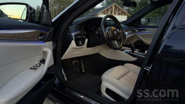 Black BMW 530 2020 in Riga, with an engine capacity of 2.00 L and mileage of 112 thousand km for 33990 €, photo 6 on AUTOMOTO.COM.LV