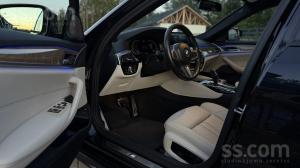 Black BMW 530 2020 in Riga, with an engine capacity of 2.00 L and mileage of 112 thousand km for 33990 €, photo 7 on AUTOMOTO.COM.LV