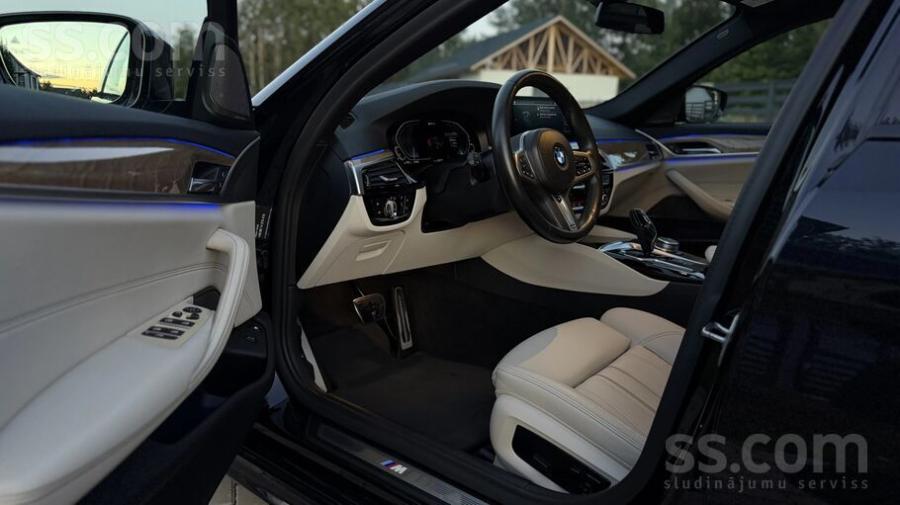 Black BMW 530 2020 in Riga, with an engine capacity of 2.00 L and mileage of 112 thousand km for 33990 €, photo 7 on AUTOMOTO.COM.LV