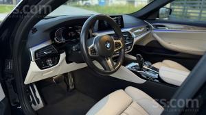 Black BMW 530 2020 in Riga, with an engine capacity of 2.00 L and mileage of 112 thousand km for 33990 €, photo 8 on AUTOMOTO.COM.LV