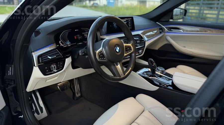 Black BMW 530 2020 in Riga, with an engine capacity of 2.00 L and mileage of 112 thousand km for 33990 €, photo 8 on AUTOMOTO.COM.LV