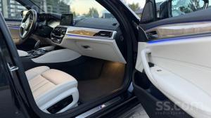 Black BMW 530 2020 in Riga, with an engine capacity of 2.00 L and mileage of 112 thousand km for 33990 €, photo 11 on AUTOMOTO.COM.LV