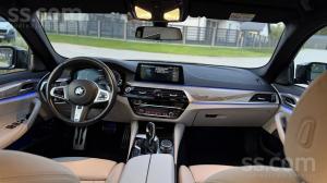 Black BMW 530 2020 in Riga, with an engine capacity of 2.00 L and mileage of 112 thousand km for 33990 €, photo 12 on AUTOMOTO.COM.LV
