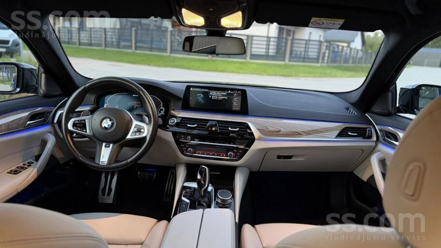 Black BMW 530 2020 in Riga, with an engine capacity of 2.00 L and mileage of 112 thousand km for 33990 €, photo 12 on AUTOMOTO.COM.LV