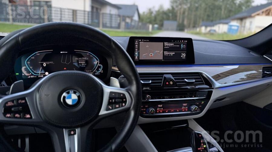 Black BMW 530 2020 in Riga, with an engine capacity of 2.00 L and mileage of 112 thousand km for 33990 €, photo 13 on AUTOMOTO.COM.LV