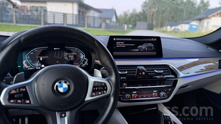 Black BMW 530 2020 in Riga, with an engine capacity of 2.00 L and mileage of 112 thousand km for 33990 €, photo 15 on AUTOMOTO.COM.LV