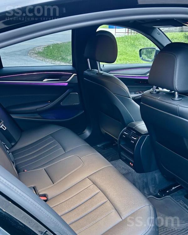 Black BMW 530 2021 in Madona, with an engine capacity of 2.00 L and mileage of 148 thousand km for 29900 €, photo 10 on AUTOMOTO.COM.LV