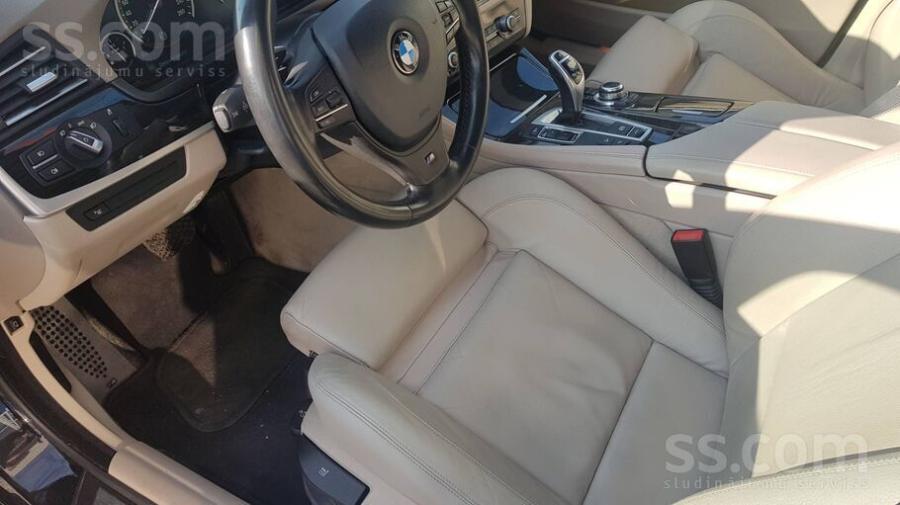 Black BMW 530 2012 in Riga, with an engine capacity of 3.00 L and mileage of 287 thousand km for 7790 €, photo 8 on AUTOMOTO.COM.LV