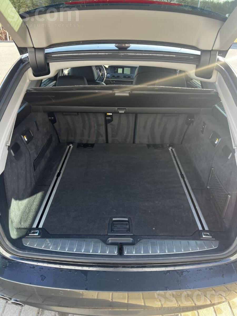 Black BMW 530 2013 in Riga, with an engine capacity of 3.00 L and mileage of 320 thousand km for 7600 €, photo 10 on AUTOMOTO.COM.LV