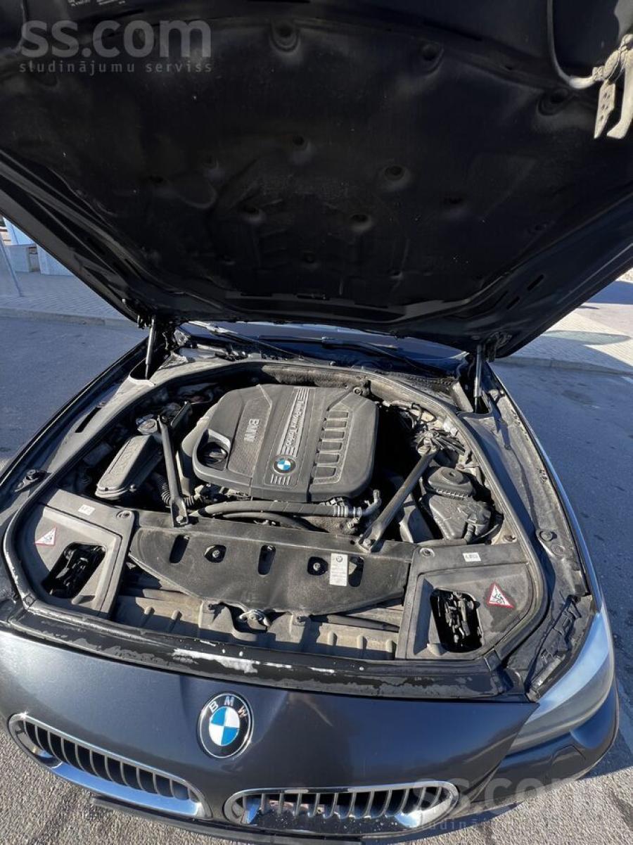 Black BMW 530 2013 in Riga, with an engine capacity of 3.00 L and mileage of 320 thousand km for 7600 €, photo 12 on AUTOMOTO.COM.LV