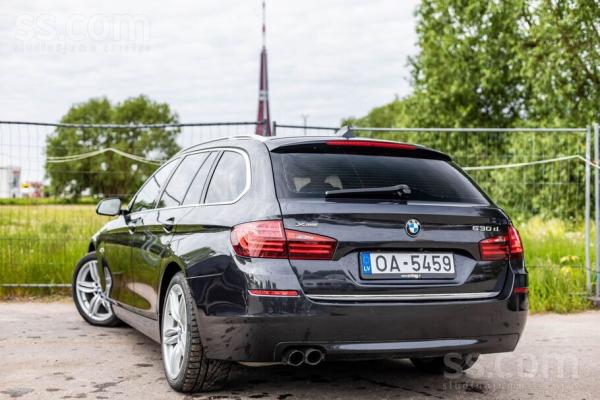 Black BMW 530 2014 in Riga, with an engine capacity of 3.00 L and mileage of 236 thousand km for 12990 €, photo 6 on AUTOMOTO.COM.LV