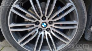 Black BMW 530 2018 in Riga, with an engine capacity of 3.00 L and mileage of 209 thousand km for 21000 €, photo 10 on AUTOMOTO.COM.LV