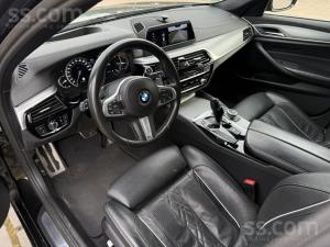 Black BMW 530 2018 in Riga, with an engine capacity of 3.00 L and mileage of 209 thousand km for 21000 €, photo 23 on AUTOMOTO.COM.LV