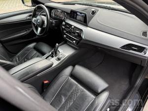 Black BMW 530 2018 in Riga, with an engine capacity of 3.00 L and mileage of 209 thousand km for 21000 €, photo 25 on AUTOMOTO.COM.LV