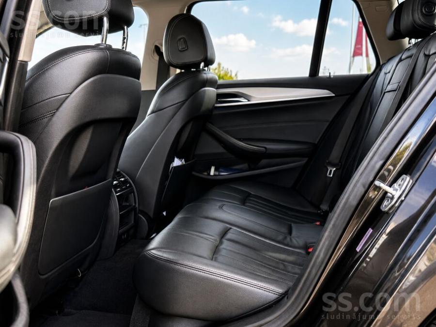 Black BMW 530 2018 in Riga, with an engine capacity of 3.00 L and mileage of 275 thousand km for 17900 €, photo 14 on AUTOMOTO.COM.LV