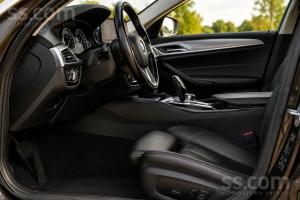 Black BMW 530 2018 in Riga, with an engine capacity of 3.00 L and mileage of 275 thousand km for 17900 €, photo 18 on AUTOMOTO.COM.LV