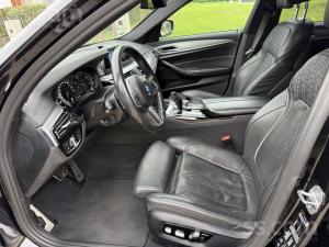 Black BMW 530 2018 in Riga, with an engine capacity of 3.00 L and mileage of 211 thousand km for 19300 €, photo 7 on AUTOMOTO.COM.LV