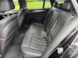 Black BMW 530 2018 in Riga, with an engine capacity of 3.00 L and mileage of 211 thousand km for 19300 €, photo 8 on AUTOMOTO.COM.LV