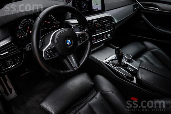 Black BMW 530 2018 in Riga, with an engine capacity of 3.00 L and mileage of 245 thousand km for 21900 €, photo 6 on AUTOMOTO.COM.LV