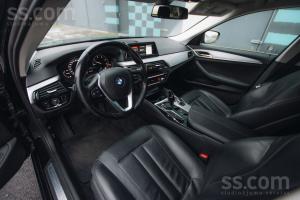 Black BMW 530 2019 in Riga, with an engine capacity of 3.00 L and mileage of 235 thousand km for 17000 €, photo 6 on AUTOMOTO.COM.LV