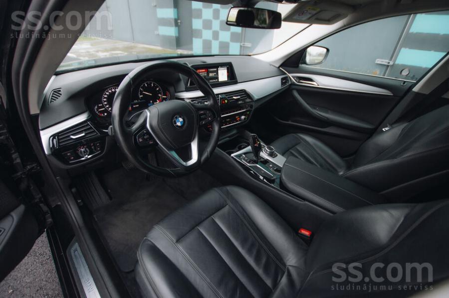 Black BMW 530 2019 in Riga, with an engine capacity of 3.00 L and mileage of 235 thousand km for 17000 €, photo 6 on AUTOMOTO.COM.LV