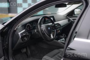 Black BMW 530 2019 in Riga, with an engine capacity of 3.00 L and mileage of 235 thousand km for 17000 €, photo 16 on AUTOMOTO.COM.LV