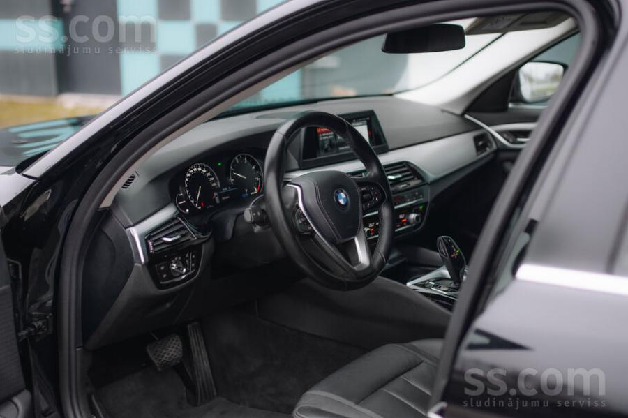 Black BMW 530 2019 in Riga, with an engine capacity of 3.00 L and mileage of 235 thousand km for 17000 €, photo 16 on AUTOMOTO.COM.LV
