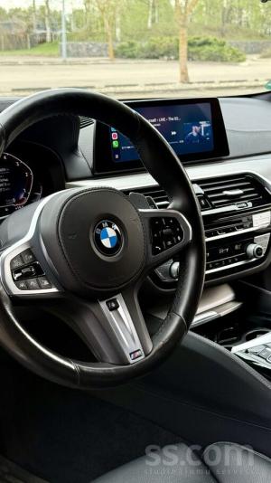 Black BMW 530 2019 in Riga, with an engine capacity of 3.00 L and mileage of 181 thousand km for 27690 €, photo 9 on AUTOMOTO.COM.LV