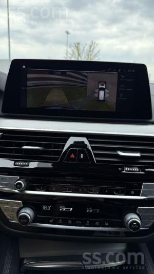 Black BMW 530 2019 in Riga, with an engine capacity of 3.00 L and mileage of 181 thousand km for 27690 €, photo 13 on AUTOMOTO.COM.LV