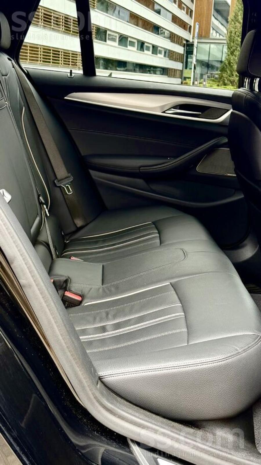 Black BMW 530 2019 in Riga, with an engine capacity of 3.00 L and mileage of 181 thousand km for 27690 €, photo 16 on AUTOMOTO.COM.LV