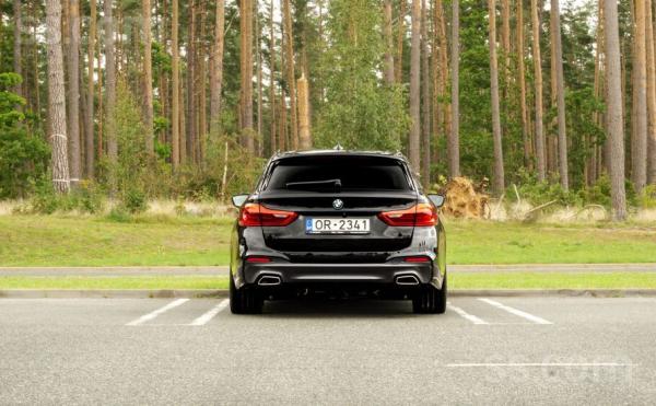 Black BMW 530 2019 in Riga, with an engine capacity of 3.00 L and mileage of 306 thousand km for 22990 €, photo 8 on AUTOMOTO.COM.LV