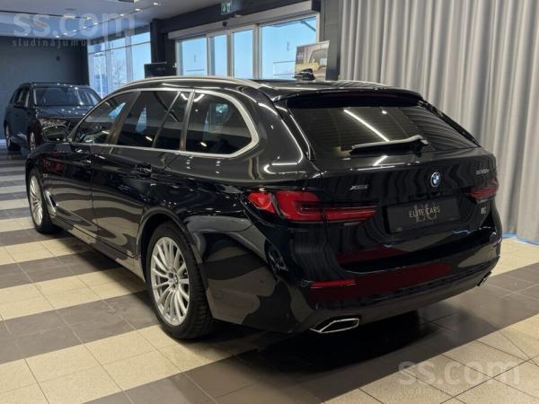 Black BMW 530 2021 in Riga, with an engine capacity of 2.00 L and mileage of 156 thousand km for 25990 €, photo 6 on AUTOMOTO.COM.LV
