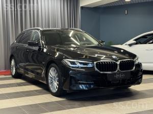Black BMW 530 2021 in Riga, with an engine capacity of 2.00 L and mileage of 156 thousand km for 25990 €, photo 3 on AUTOMOTO.COM.LV