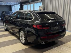 Black BMW 530 2021 in Riga, with an engine capacity of 2.00 L and mileage of 156 thousand km for 25990 €, photo 6 on AUTOMOTO.COM.LV