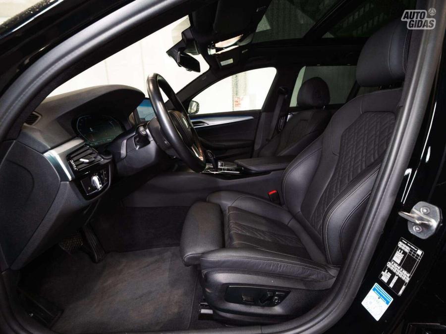 Black BMW 530 2021 in Marijampole, with an engine capacity of 3.00 L and mileage of 77 thousand km for 34950 €, photo 24 on AUTOMOTO.COM.LV