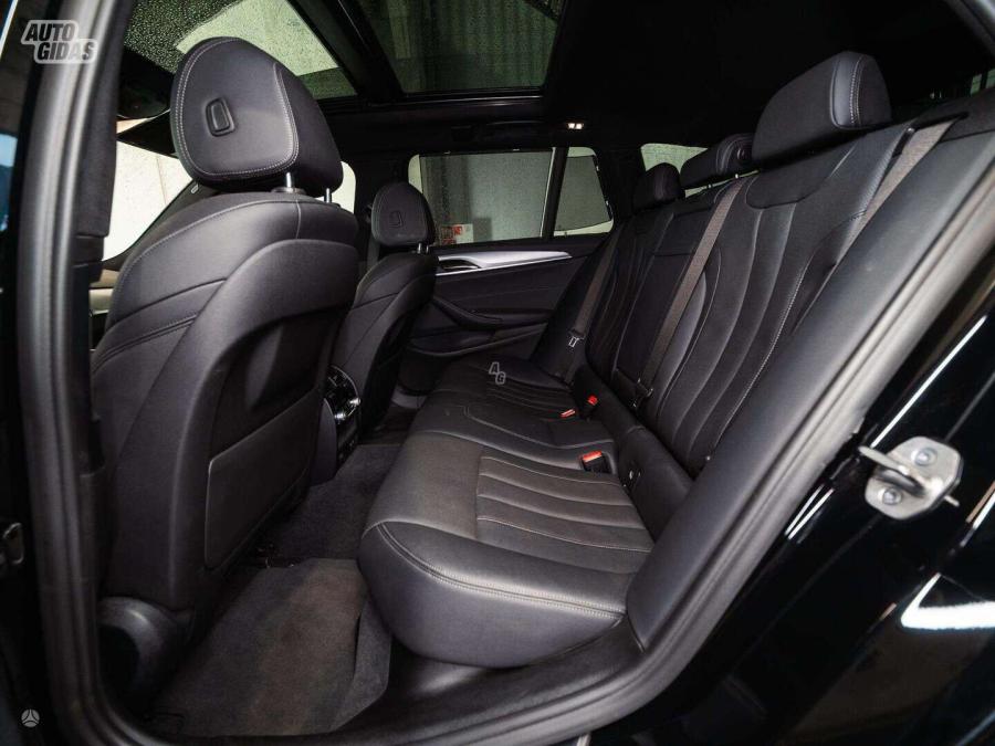 Black BMW 530 2021 in Marijampole, with an engine capacity of 3.00 L and mileage of 77 thousand km for 34950 €, photo 32 on AUTOMOTO.COM.LV